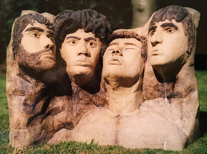 Make a sculpture of four faces embedded into mount rushmore by ...