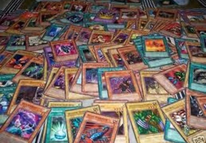 Send you ten random yugioh cards with one guaranteed holo rare by Hayga ...