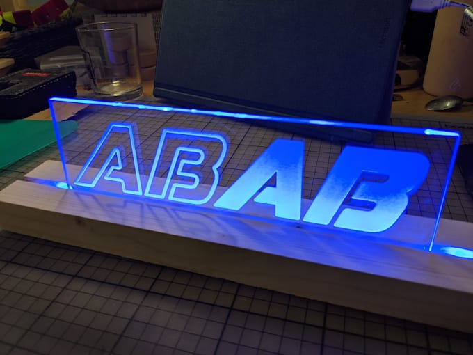 Laser cut and engrave led lighted logo by Zoltanacs | Fiverr