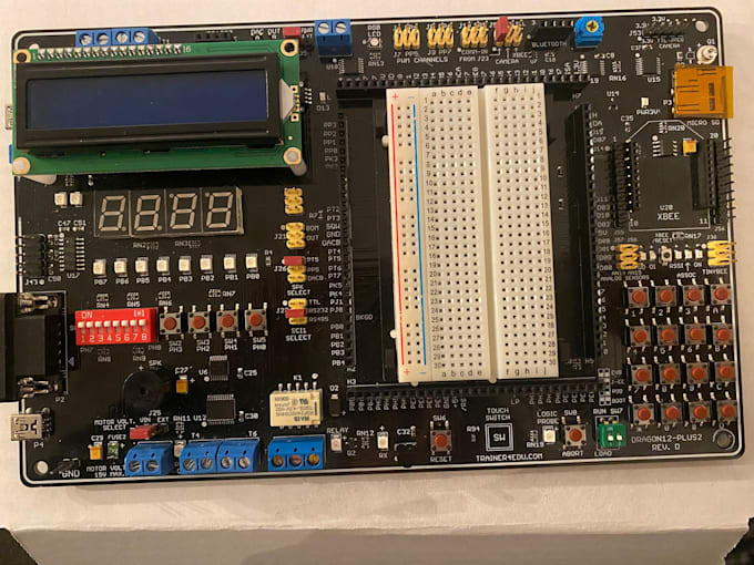 Teach hcs12 with code warrior on dragon12 board by Microproteacher | Fiverr