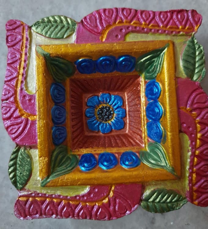 Make beautiful hand painted colorful diyas by Devikapulla | Fiverr