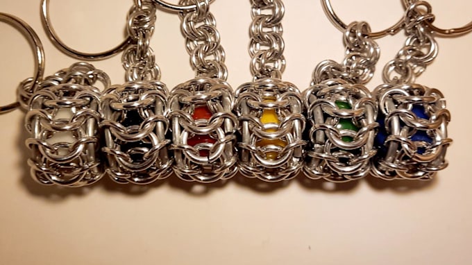 Create handmade chainmail encased marble keychains for you by ...