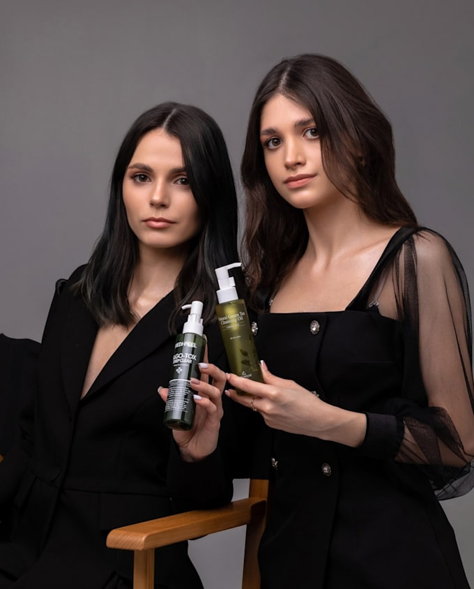 Two professional models promote the latest fashion brands by ...